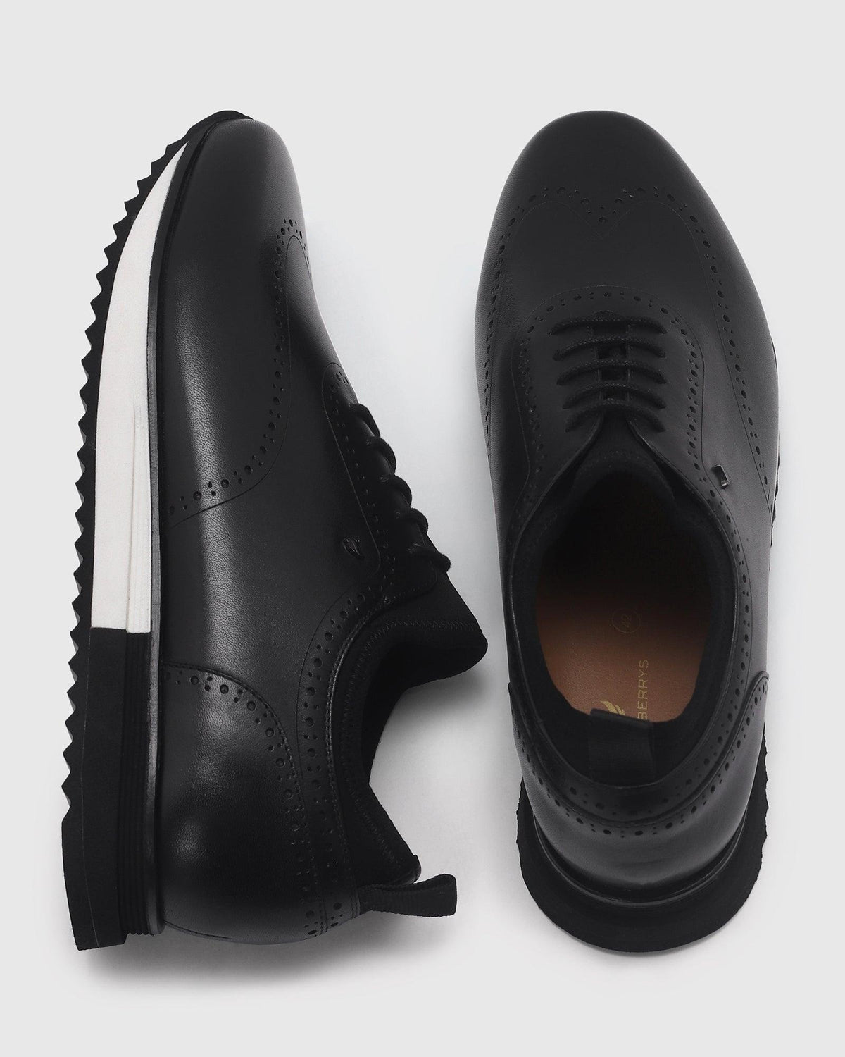 Buy Leather Casual Black Solid Sneakers Online